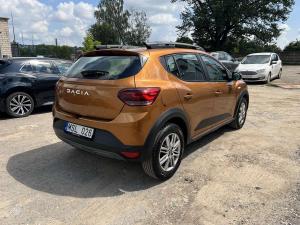 Orange Dacia Sandero 2023 in Kaunas, with an engine capacity of 1.00 L and mileage of 12 thousand km for 6900 €, photo 4 on AUTOMOTO.COM.LV
