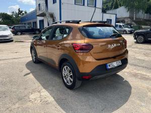 Orange Dacia Sandero 2023 in Kaunas, with an engine capacity of 1.00 L and mileage of 12 thousand km for 6900 €, photo 5 on AUTOMOTO.COM.LV