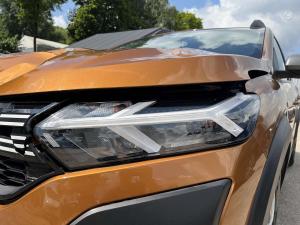 Orange Dacia Sandero 2023 in Kaunas, with an engine capacity of 1.00 L and mileage of 12 thousand km for 6900 €, photo 14 on AUTOMOTO.COM.LV