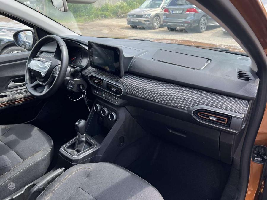 Orange Dacia Sandero 2023 in Kaunas, with an engine capacity of 1.00 L and mileage of 12 thousand km for 6900 €, photo 16 on AUTOMOTO.COM.LV