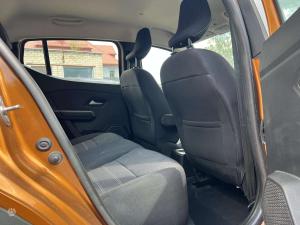 Orange Dacia Sandero 2023 in Kaunas, with an engine capacity of 1.00 L and mileage of 12 thousand km for 6900 €, photo 17 on AUTOMOTO.COM.LV