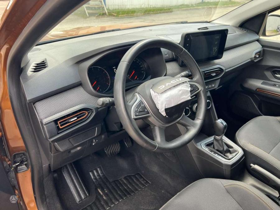 Orange Dacia Sandero 2023 in Kaunas, with an engine capacity of 1.00 L and mileage of 12 thousand km for 6900 €, photo 19 on AUTOMOTO.COM.LV