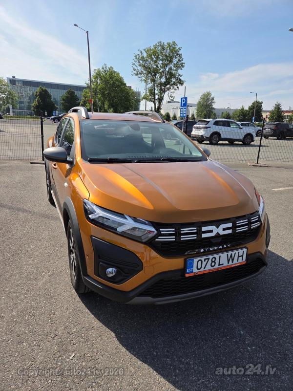 Orange Dacia Sandero 2023 in Tallinn, with an engine capacity of 1.00 L and mileage of 25 thousand km for 15700 €, photo 2 on AUTOMOTO.COM.LV