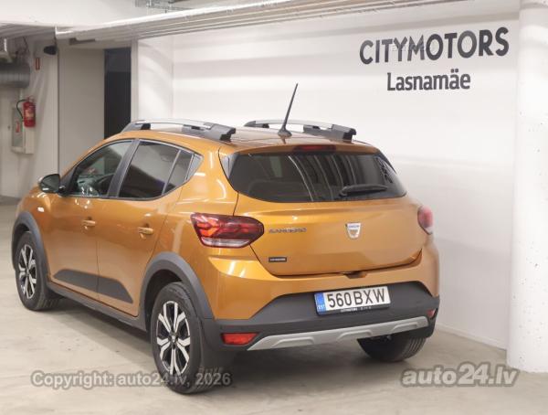 Orange Dacia Sandero 2023 in Tallinn, with an engine capacity of 1.00 L and mileage of 63 thousand km for 11900 €, photo 3 on AUTOMOTO.COM.LV