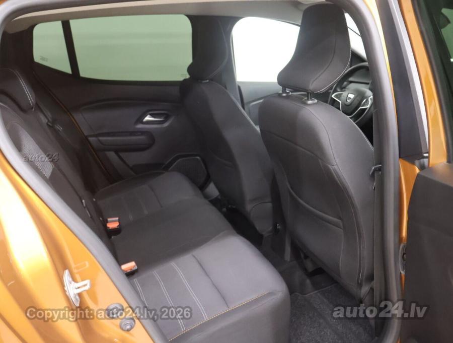 Orange Dacia Sandero 2023 in Tallinn, with an engine capacity of 1.00 L and mileage of 63 thousand km for 11900 €, photo 9 on AUTOMOTO.COM.LV