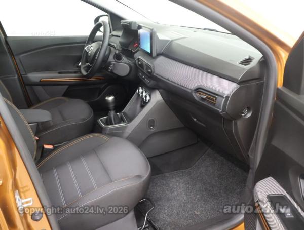 Orange Dacia Sandero 2023 in Tallinn, with an engine capacity of 1.00 L and mileage of 63 thousand km for 11900 €, photo 9 on AUTOMOTO.COM.LV
