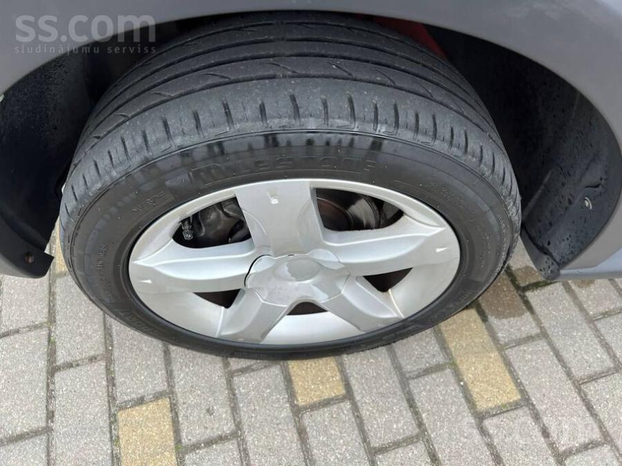 Sarkans Dacia Sandero 2010 Talsi, ar dzinēja tilpumu 1.60 L un nobraukumu 189 tūkst. km par 6370 €, foto 19 vietnē AUTOMOTO.COM.LV