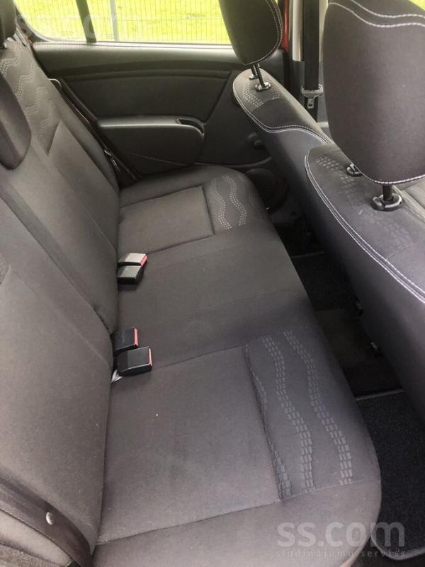 Red Dacia Sandero 2012 in Valmiera, with an engine capacity of 1.60 L and mileage of 204 thousand km for 4290 €, photo 7 on AUTOMOTO.COM.LV