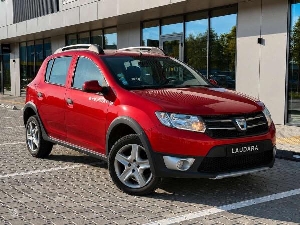 Red Dacia Sandero 2013 in Vilnius, with an engine capacity of 1.46 L and mileage of 232 thousand km for 3950 €, photo 1 on AUTOMOTO.COM.LV