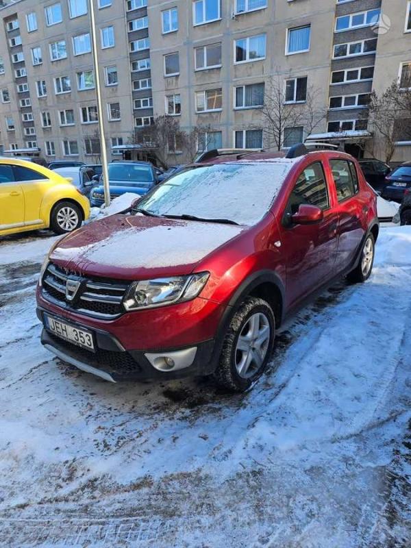 Red Dacia Sandero 2016 in Vilnius, with an engine capacity of 0.90 L and mileage of 118 thousand km for 8100 €, photo 1 on AUTOMOTO.COM.LV