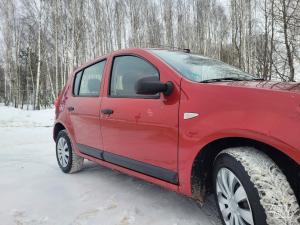 Red Dacia Sandero 2009 in Vilnius, with an engine capacity of 1.40 L and mileage of 106 thousand km for 1550 €, photo 10 on AUTOMOTO.COM.LV