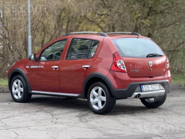 Red Dacia Sandero 2010 in Riga, with an engine capacity of 1.60 L and mileage of 150 thousand km for 3990 €, photo 5 on AUTOMOTO.COM.LV