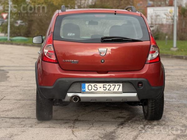Red Dacia Sandero 2010 in Riga, with an engine capacity of 1.60 L and mileage of 150 thousand km for 3990 €, photo 7 on AUTOMOTO.COM.LV