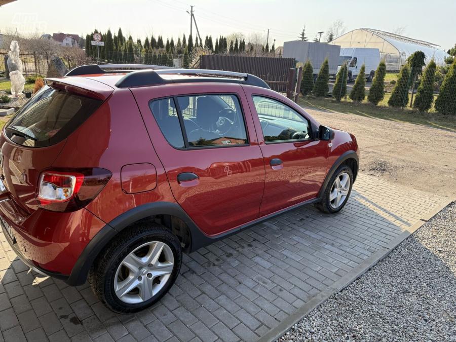 Red Dacia Sandero 2015 in Vilnius, with an engine capacity of 0.90 L and mileage of 61 thousand km for 4750 €, photo 5 on AUTOMOTO.COM.LV