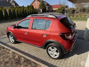 Red Dacia Sandero 2015 in Vilnius, with an engine capacity of 0.90 L and mileage of 61 thousand km for 4750 €, photo 9 on AUTOMOTO.COM.LV