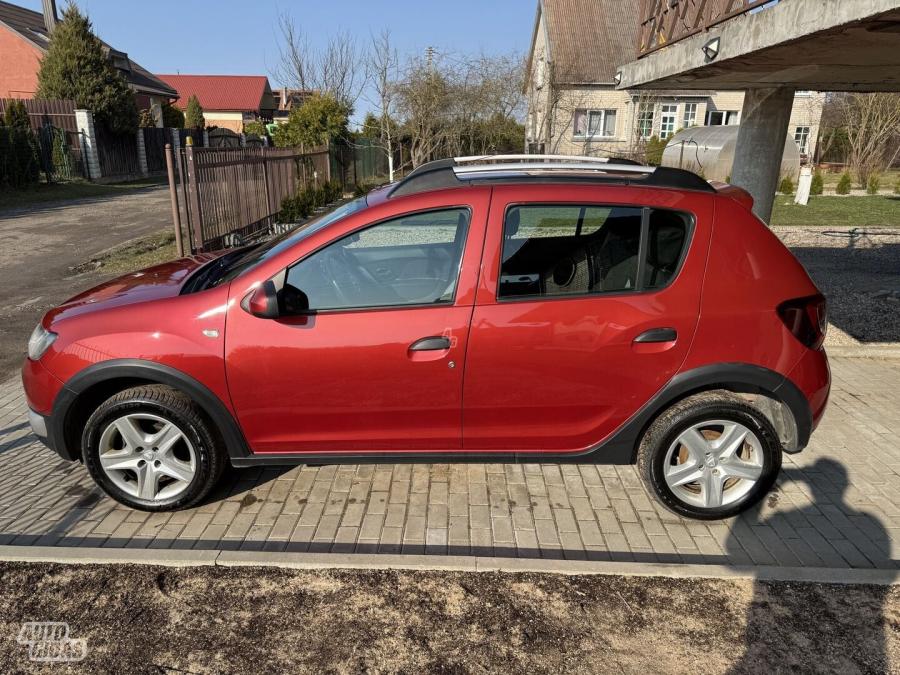 Red Dacia Sandero 2015 in Vilnius, with an engine capacity of 0.90 L and mileage of 61 thousand km for 4750 €, photo 10 on AUTOMOTO.COM.LV