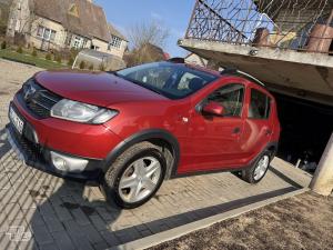 Red Dacia Sandero 2015 in Vilnius, with an engine capacity of 0.90 L and mileage of 61 thousand km for 4750 €, photo 11 on AUTOMOTO.COM.LV