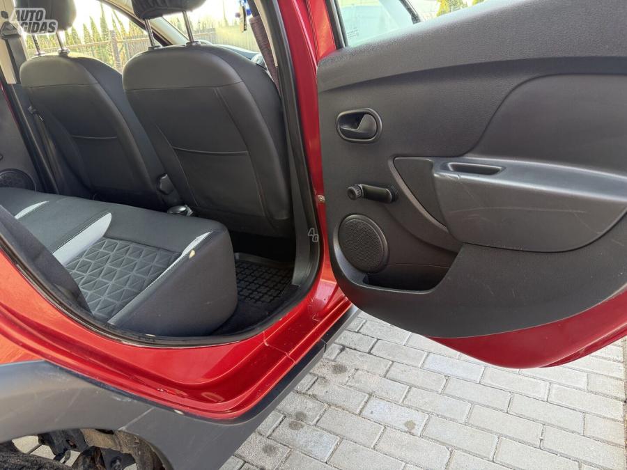 Red Dacia Sandero 2015 in Vilnius, with an engine capacity of 0.90 L and mileage of 61 thousand km for 4750 €, photo 23 on AUTOMOTO.COM.LV