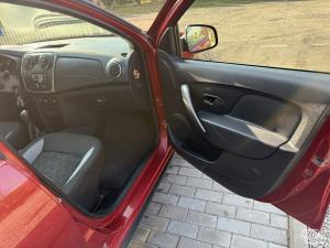Red Dacia Sandero 2015 in Vilnius, with an engine capacity of 0.90 L and mileage of 61 thousand km for 4750 €, photo 25 on AUTOMOTO.COM.LV