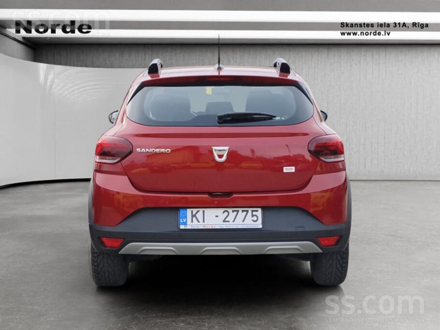 Red Dacia Sandero 2021 in Riga, with an engine capacity of 1.00 L and mileage of 54 thousand km for 10950 €, photo 4 on AUTOMOTO.COM.LV
