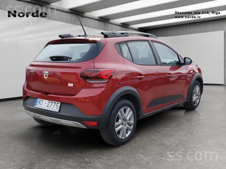 Red Dacia Sandero 2021 in Riga, with an engine capacity of 1.00 L and mileage of 54 thousand km for 10950 €, photo 5 on AUTOMOTO.COM.LV