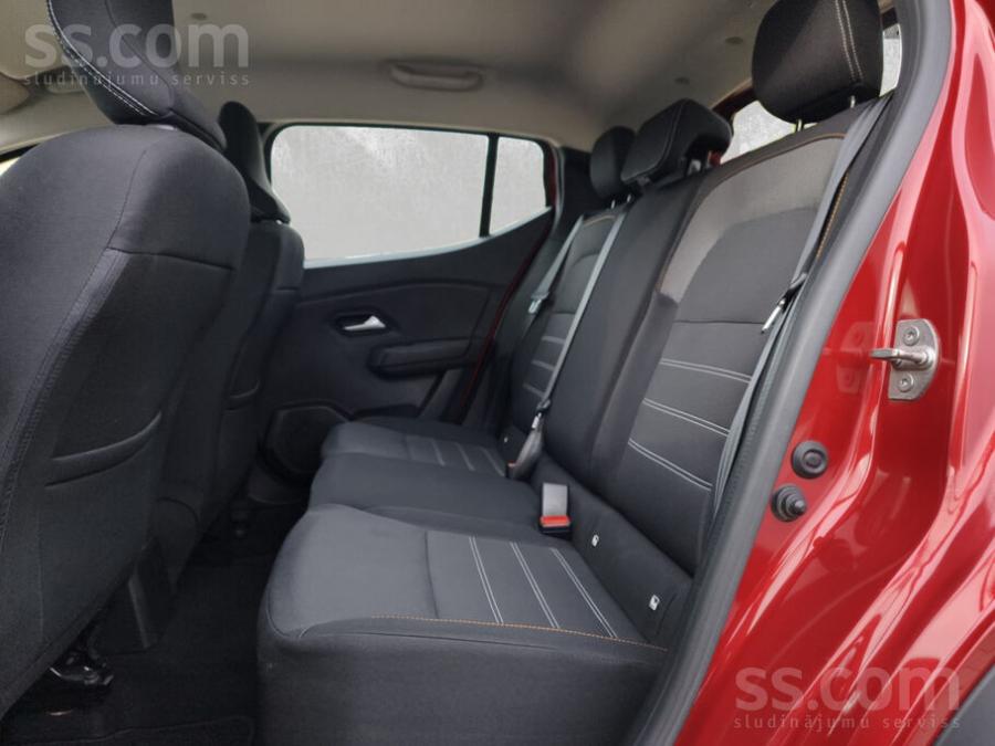 Red Dacia Sandero 2021 in Riga, with an engine capacity of 1.00 L and mileage of 54 thousand km for 10950 €, photo 9 on AUTOMOTO.COM.LV