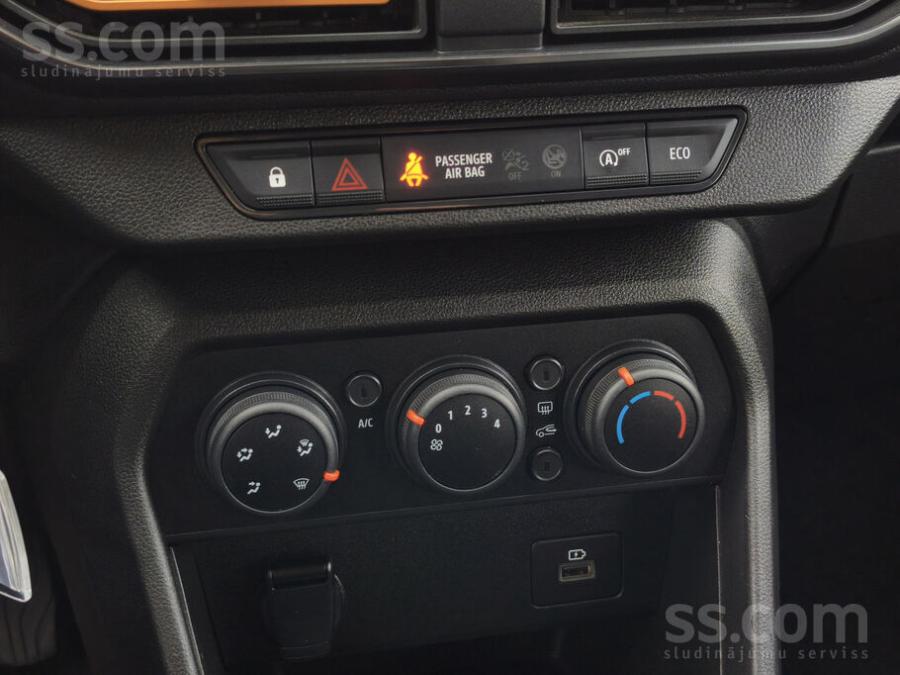Red Dacia Sandero 2021 in Riga, with an engine capacity of 1.00 L and mileage of 54 thousand km for 10950 €, photo 18 on AUTOMOTO.COM.LV