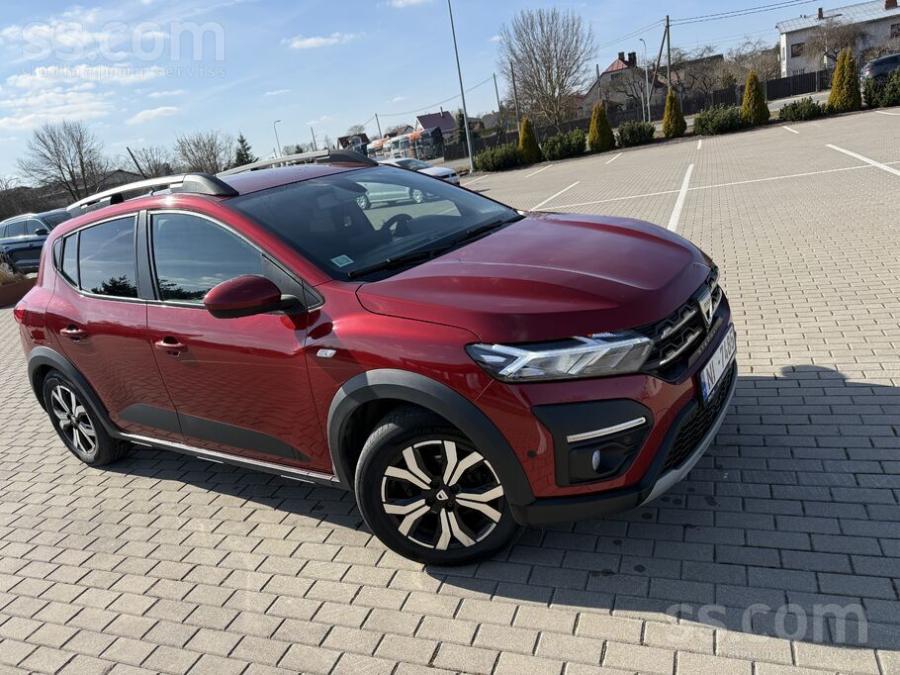 Red Dacia Sandero 2022 in Riga, with an engine capacity of 1.00 L and mileage of 33 thousand km for 11800 €, photo 3 on AUTOMOTO.COM.LV