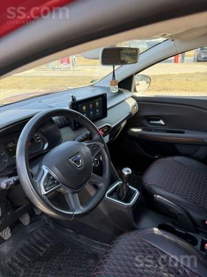 Red Dacia Sandero 2022 in Riga, with an engine capacity of 1.00 L and mileage of 33 thousand km for 11800 €, photo 5 on AUTOMOTO.COM.LV