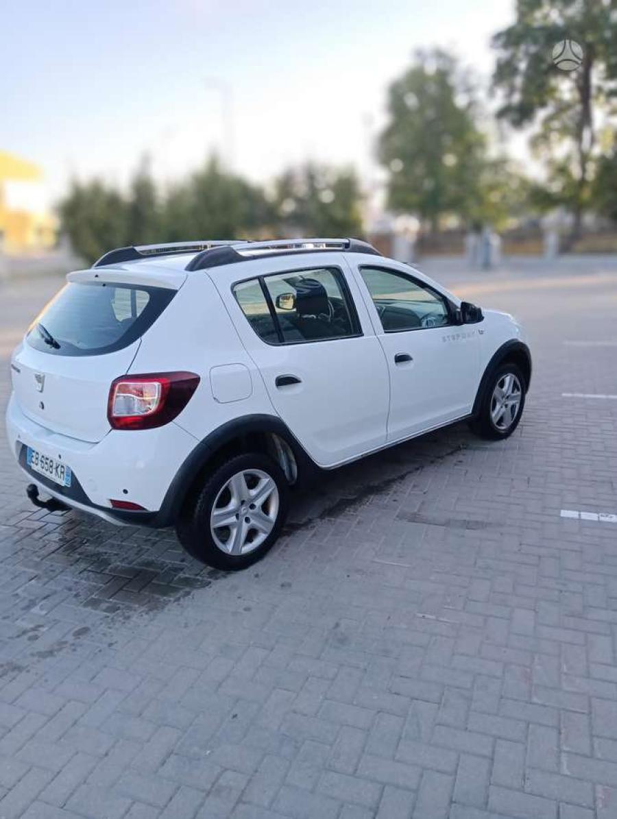 White Dacia Sandero 2016 in Taurage, with an engine capacity of 1.46 L and mileage of 240 thousand km for 3650 €, photo 15 on AUTOMOTO.COM.LV