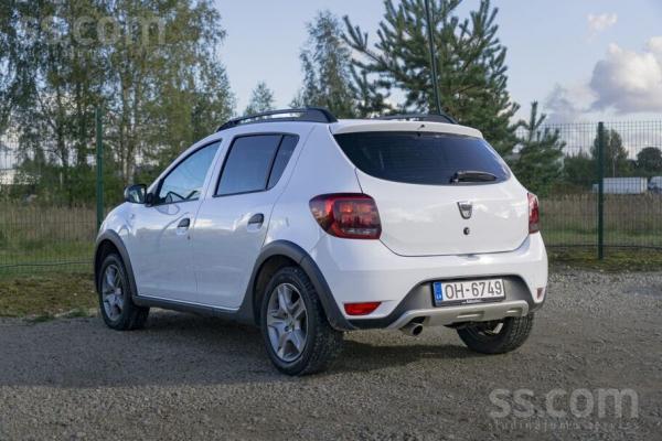 White Dacia Sandero 2019 in Riga, with an engine capacity of 0.90 L and mileage of 147 thousand km for 7290 €, photo 4 on AUTOMOTO.COM.LV