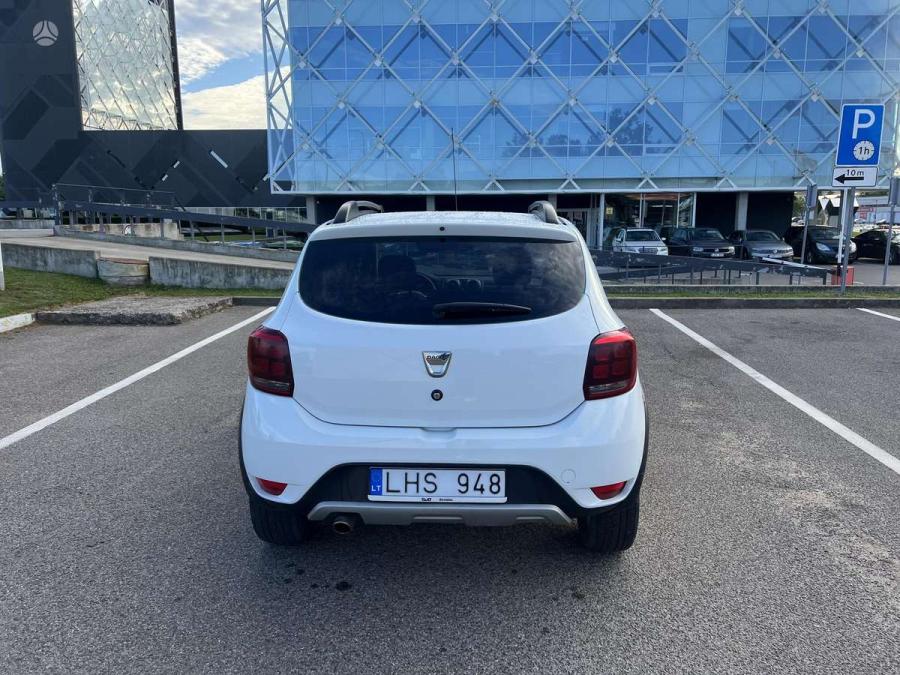 White Dacia Sandero 2019 in Kaunas, with an engine capacity of 0.90 L and mileage of 67 thousand km for 5499 €, photo 5 on AUTOMOTO.COM.LV