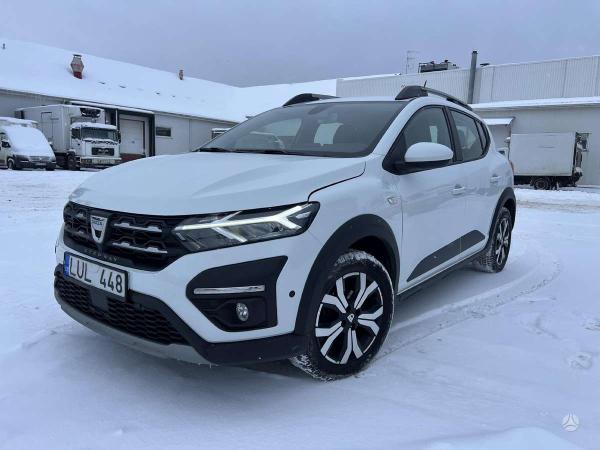 White Dacia Sandero 2021 in Kaunas, with an engine capacity of 1.00 L and mileage of 100 thousand km for 7900 €, photo 1 on AUTOMOTO.COM.LV