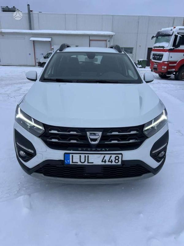 White Dacia Sandero 2021 in Kaunas, with an engine capacity of 1.00 L and mileage of 100 thousand km for 7900 €, photo 2 on AUTOMOTO.COM.LV