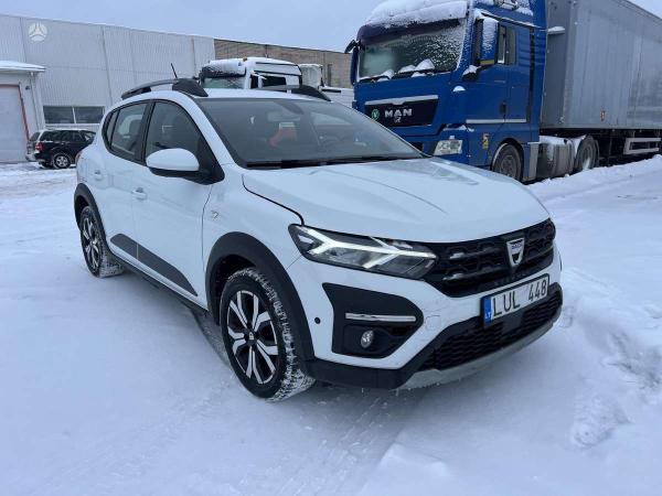 White Dacia Sandero 2021 in Kaunas, with an engine capacity of 1.00 L and mileage of 100 thousand km for 7900 €, photo 3 on AUTOMOTO.COM.LV