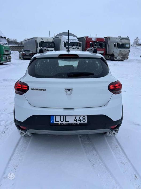 White Dacia Sandero 2021 in Kaunas, with an engine capacity of 1.00 L and mileage of 100 thousand km for 7900 €, photo 6 on AUTOMOTO.COM.LV