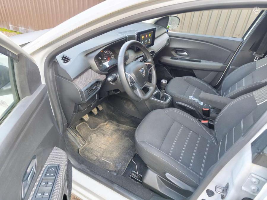 White Dacia Sandero 2021 in Kaunas, with an engine capacity of 1.00 L and mileage of 98 thousand km for 4200 €, photo 10 on AUTOMOTO.COM.LV