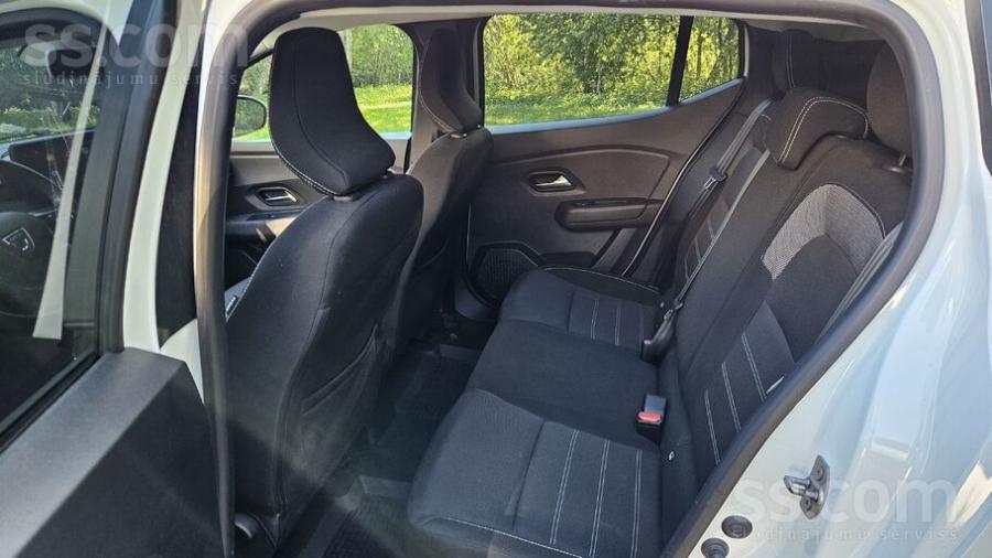 White Dacia Sandero 2022 in Riga, with an engine capacity of 1.00 L and mileage of 51 thousand km for 9250 €, photo 14 on AUTOMOTO.COM.LV