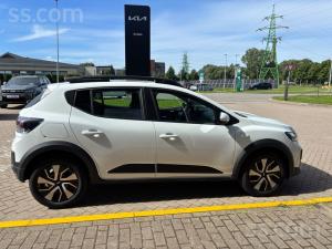 White Dacia Sandero 2026 in Liepaja, with an engine capacity of 1.20 L and mileage of 0 thousand km for 17320 €, photo 5 on AUTOMOTO.COM.LV