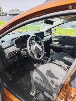 Yellow Dacia Sandero 2023 in Kaunas, with an engine capacity of 1.00 L and mileage of 12 thousand km for 6700 €, photo 7 on AUTOMOTO.COM.LV