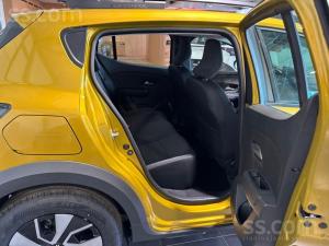 Yellow Dacia Sandero 2026 in Liepaja, with an engine capacity of 1.20 L and mileage of 0 thousand km for 19940 €, photo 19 on AUTOMOTO.COM.LV