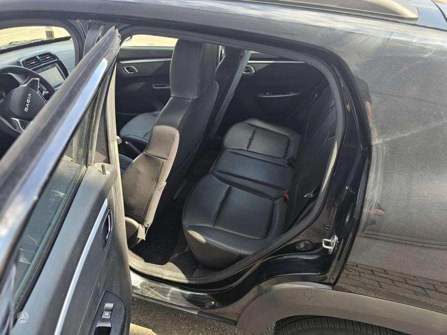 Black Dacia Spring 2023 in Kaunas, with an engine capacity of 0.00 L and mileage of 73 thousand km for 8500 €, photo 19 on AUTOMOTO.COM.LV