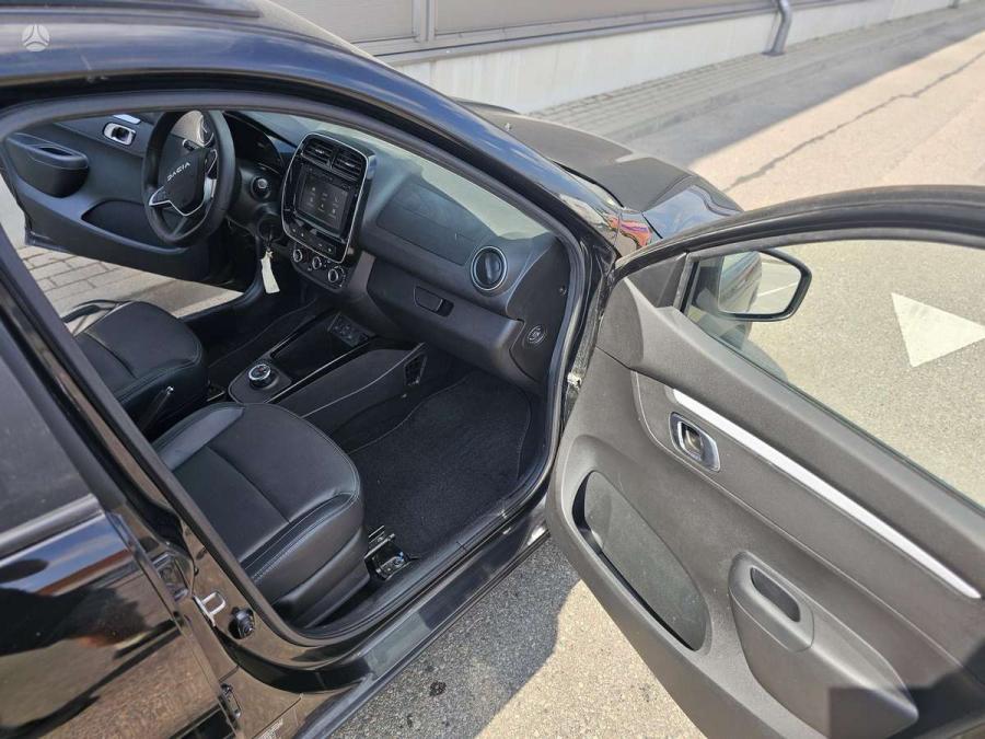 Black Dacia Spring 2023 in Kaunas, with an engine capacity of 0.00 L and mileage of 73 thousand km for 8500 €, photo 24 on AUTOMOTO.COM.LV