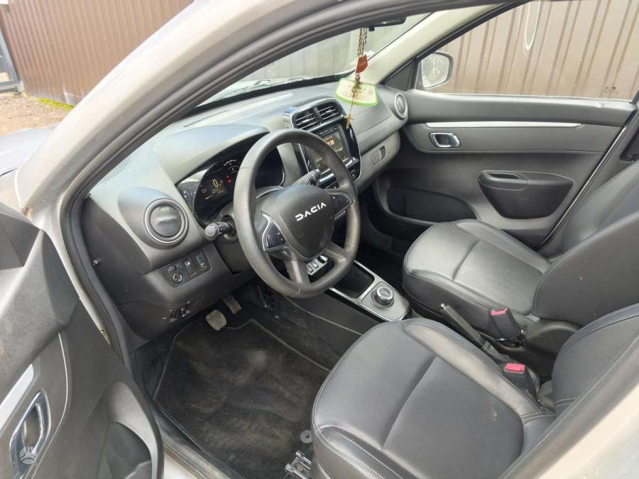 Grey Dacia Spring 2023 in Kaunas, with an engine capacity of 0.00 L and mileage of 30 thousand km for 5700 €, photo 9 on AUTOMOTO.COM.LV