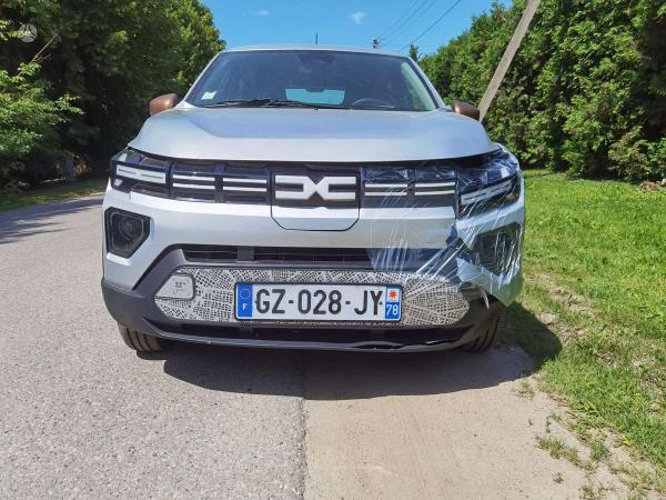 Grey Dacia Spring 2024 in Kaunas, with an engine capacity of 0.00 L and mileage of 6 thousand km for 6900 €, photo 3 on AUTOMOTO.COM.LV