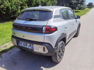 Grey Dacia Spring 2024 in Kaunas, with an engine capacity of 0.00 L and mileage of 6 thousand km for 6900 €, photo 6 on AUTOMOTO.COM.LV