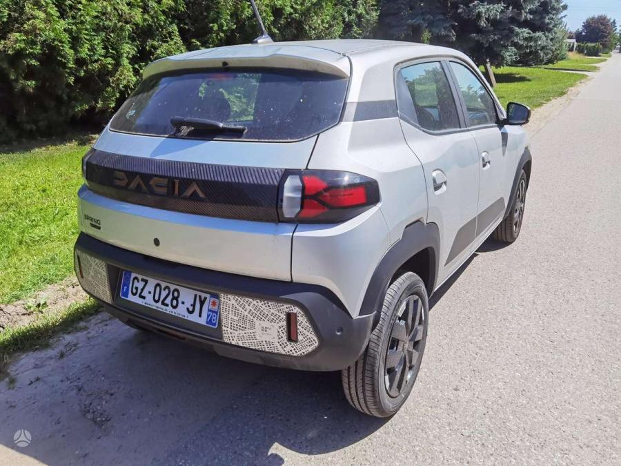 Grey Dacia Spring 2024 in Kaunas, with an engine capacity of 0.00 L and mileage of 6 thousand km for 6900 €, photo 6 on AUTOMOTO.COM.LV