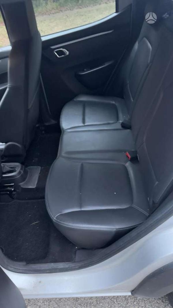 Grey Dacia Spring 2023 in Kaunas, with an engine capacity of 0.00 L and mileage of 60 thousand km for 5300 €, photo 9 on AUTOMOTO.COM.LV