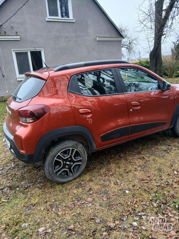 Red Dacia Spring 2024 in Panevezys, with an engine capacity of 0.00 L and mileage of 27 thousand km for 10500 €, photo 3 on AUTOMOTO.COM.LV