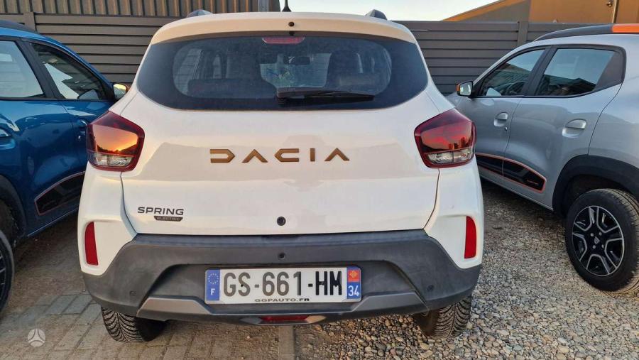 White Dacia Spring 2023 in Kaunas, with an engine capacity of 0.00 L and mileage of 25 thousand km for 5600 €, photo 3 on AUTOMOTO.COM.LV
